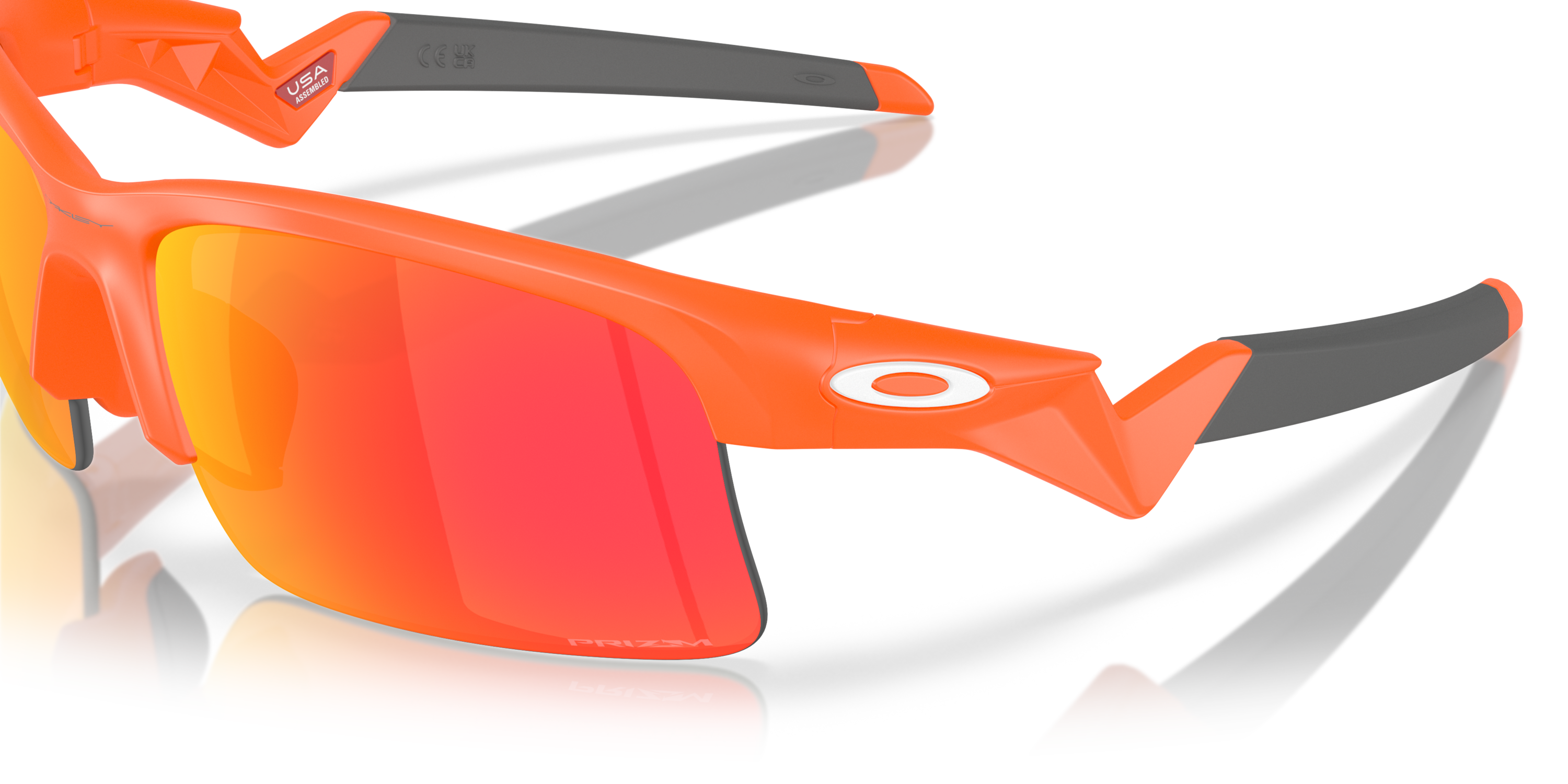 Capacitor (Youth Fit) Prizm Ruby Lenses, Matte Neon Orange Frame ...